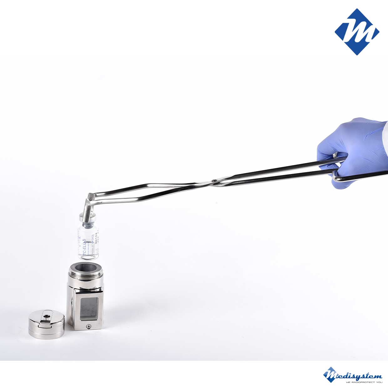 Manipulation tongs to handle the vials remotely - Medisystem