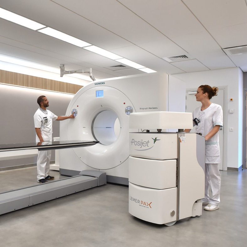 Reducing Occupational Exposure During PET-CT Scans with an Automated ...